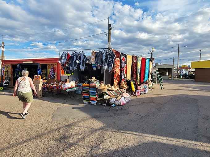 Colorful vendor stalls line both sides like a treasure map leading to your next great discovery.