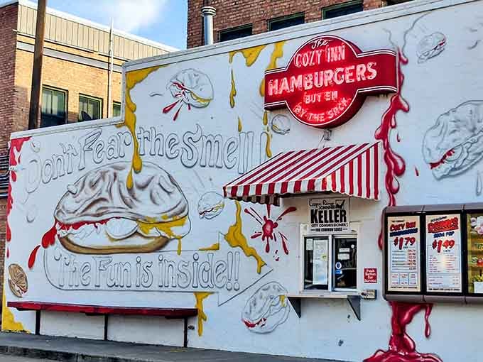 "Don't fear the smell!" The Cozy Inn's playful mural tells you everything you need to know about their legendary onion-laden sliders.