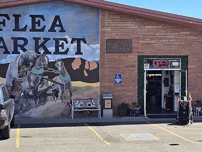 The striking mural of horses brings Old West charm to this brick building's welcoming entrance.