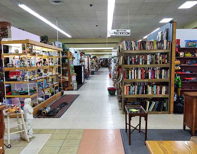 Clean, well-lit aisles stretch endlessly, making this indoor market a book lover's climate-controlled paradise.