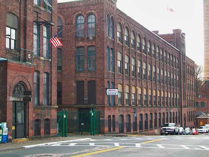 This massive brick mill building stretches along the street like a monument to the hardworking souls who once filled it.