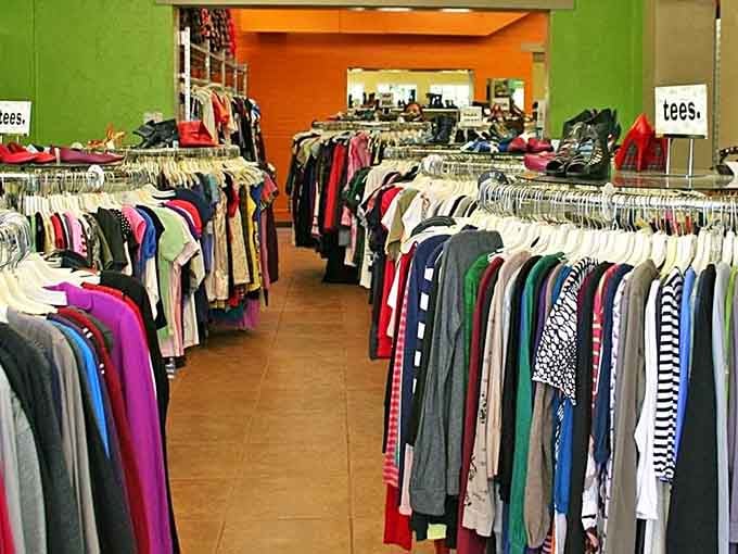 Inside, endless racks of clothing stretch toward the horizon like a rainbow made entirely of fabric and possibilities.