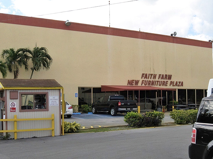 Palm trees frame the entrance to this sprawling plaza where new-to-you furniture finds their forever homes.