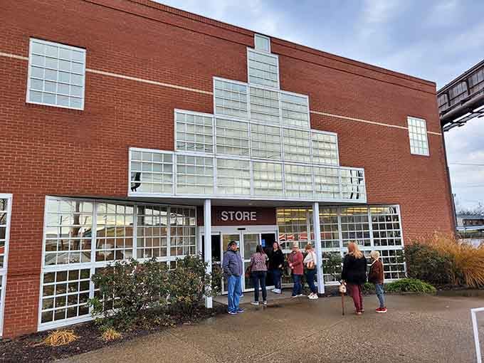 Shoppers line up at the entrance, eager to explore the constantly rotating inventory inside this architectural gem of a store.