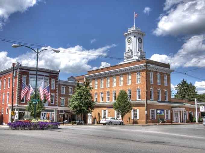 That clock tower building could double as a movie set, except the affordable living here is refreshingly real.