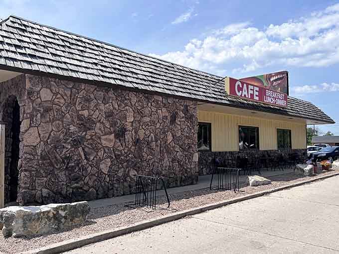 Stone and wood exterior hiding gravy-covered treasures within. This is where calories don't count and portions defy physics.