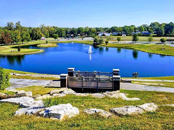 That brilliant blue pond with its dancing fountain creates a peaceful oasis that looks like a postcard come to life.