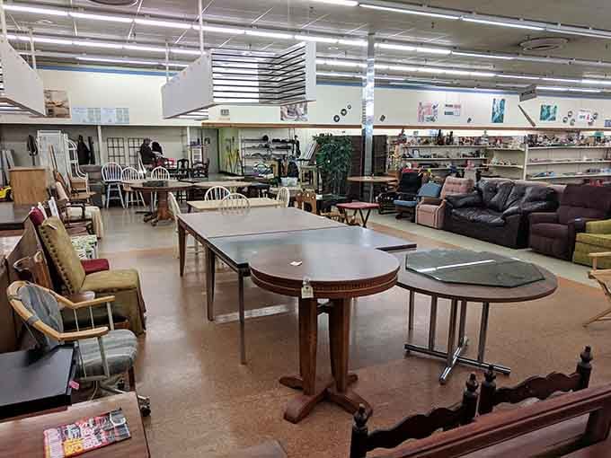 Tables and chairs create a furniture maze where your perfect dining set might be hiding around any corner.