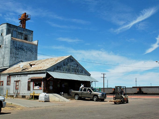 Historic grain elevators stand tall behind downtown, monuments to a working town where people still make honest livings.