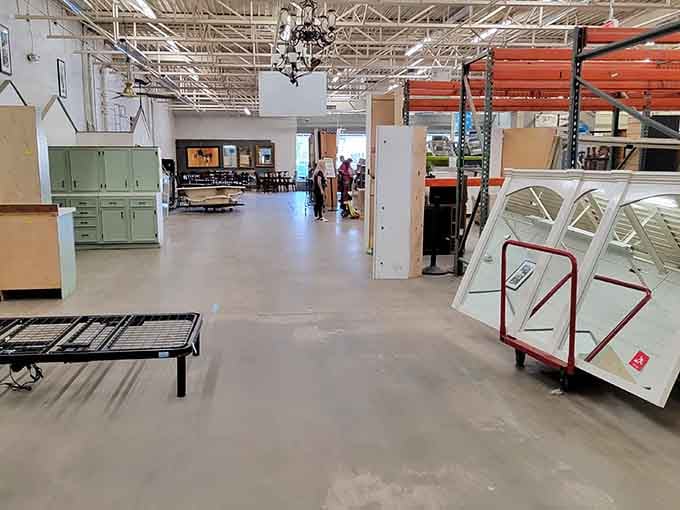 This warehouse interior reveals endless possibilities, from vintage cabinets to doors waiting to become someone's perfect home project.