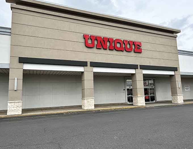 The stone accent pillars add unexpected elegance to a thrift store, proving secondhand shopping has seriously upgraded its image.