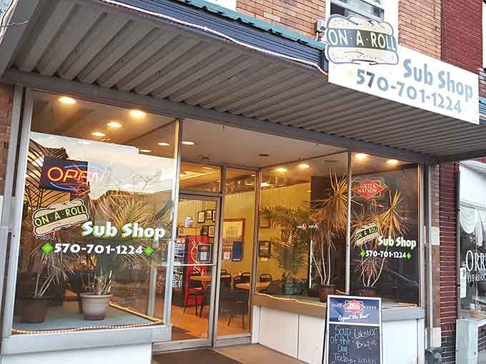 The vintage awning and brick facade create that timeless Main Street America vibe we all remember fondly.
