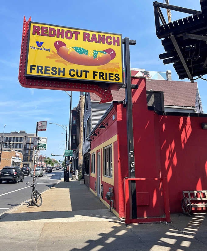 That cheerful hot dog sign isn't just decoration &ndash; it's a promise of Chicago street food perfection.