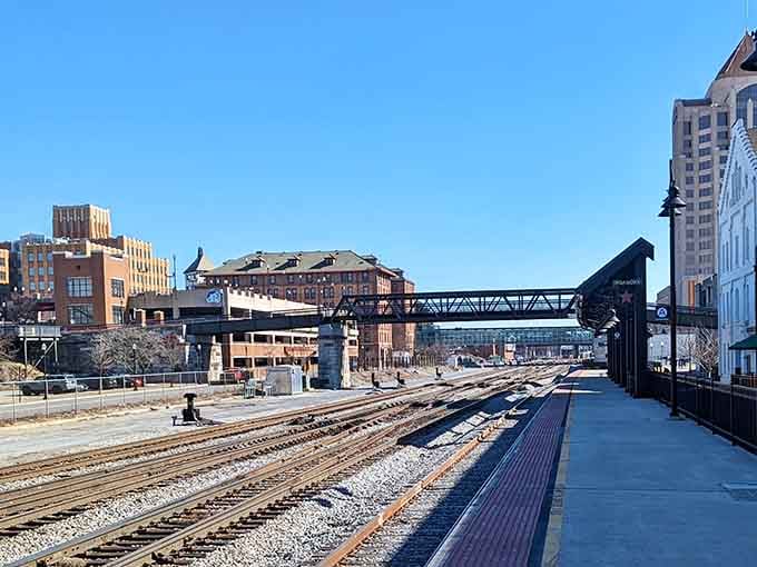 Railroad tracks stretch through town like veins of history, connecting past and present in one beautiful industrial landscape.