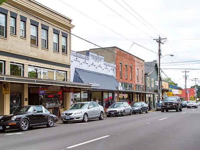 Classic storefronts line up like old friends, each one adding character to this welcoming downtown neighborhood.