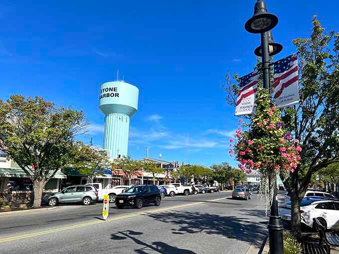 That iconic water tower rises above tree-lined streets like a lighthouse guiding visitors to this elegant shore community.