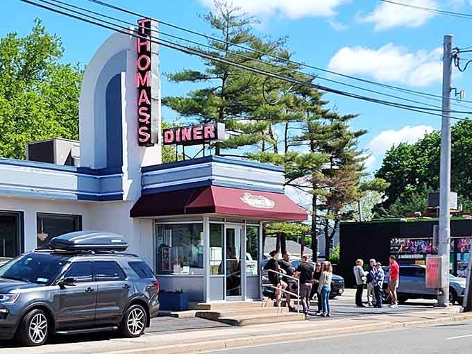Thomas's Ham & Eggery stands proud in daylight, a temple to the art of breakfast. Their pancakes have prevented countless morning grumpiness epidemics.