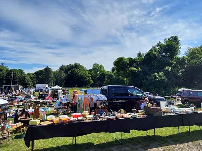 Crowds gather around tables overflowing with everything imaginable, proving one person's clutter is another's Saturday morning jackpot.