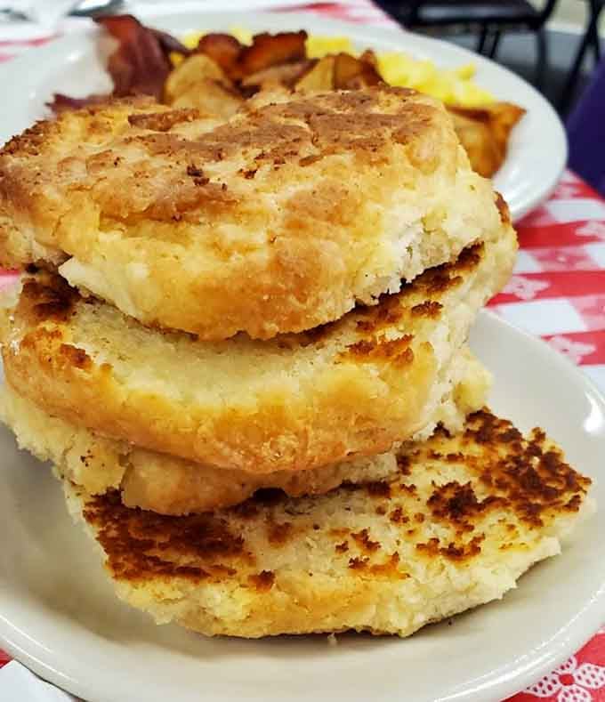 Those hot cakes stacked three high are basically edible architecture, golden and glorious in their breakfast tower formation.