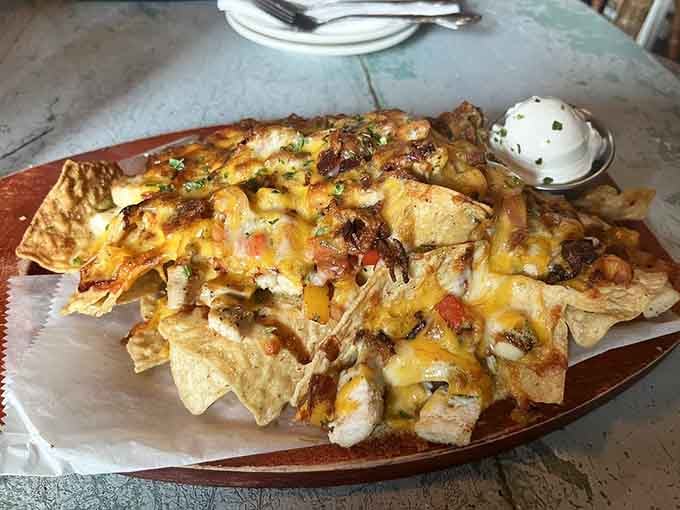 Nachos piled this high suggest the kitchen staff doesn't understand the concept of moderation, bless them.