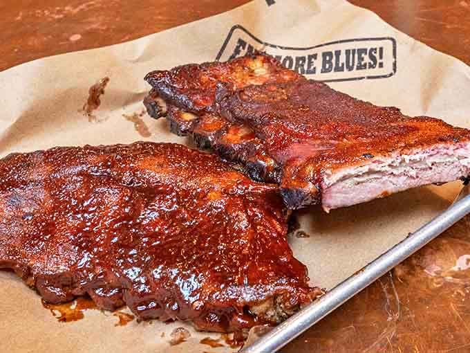 These ribs don't just fall off the bone &ndash; they practically leap into your mouth, glistening with a sauce that balances sweet, tangy, and smoky notes.