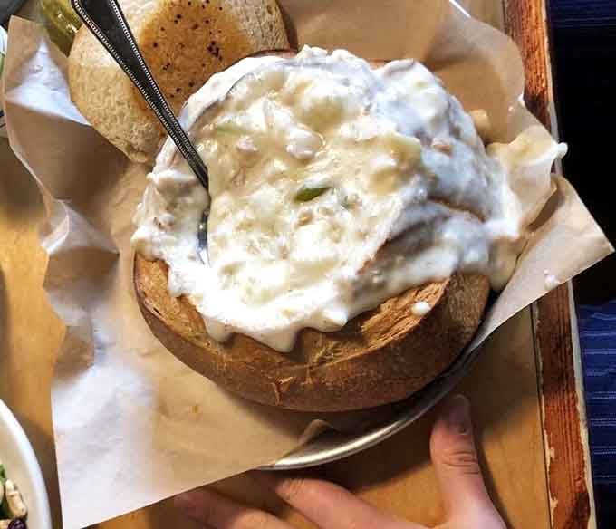 That bread bowl is working overtime. Clam chowder so thick and generous it practically qualifies as a solid food.