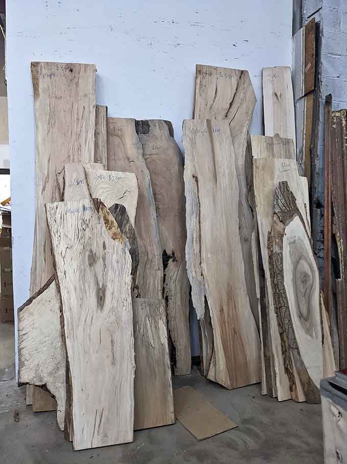 Raw, natural wood slabs await transformation&mdash;perfect for that DIY dining table project you've been pinning but never starting.
