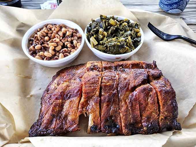 These ribs have that perfect bark and color that makes grown adults consider abandoning all table manners immediately.