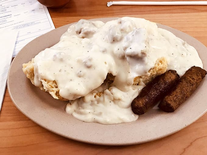 Biscuits drowning in country gravy with sausage links standing guard: this is what comfort food dreams are made of.