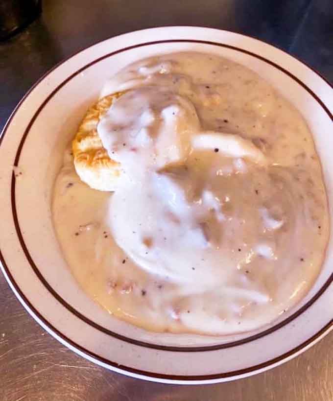 Gravity-defying gravy blankets a golden biscuit like a warm North Dakota morning. Comfort food that speaks a universal language.