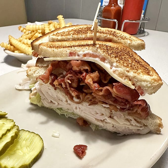 Layers of turkey and bacon stacked like a delicious Jenga tower that you actually want to collapse.