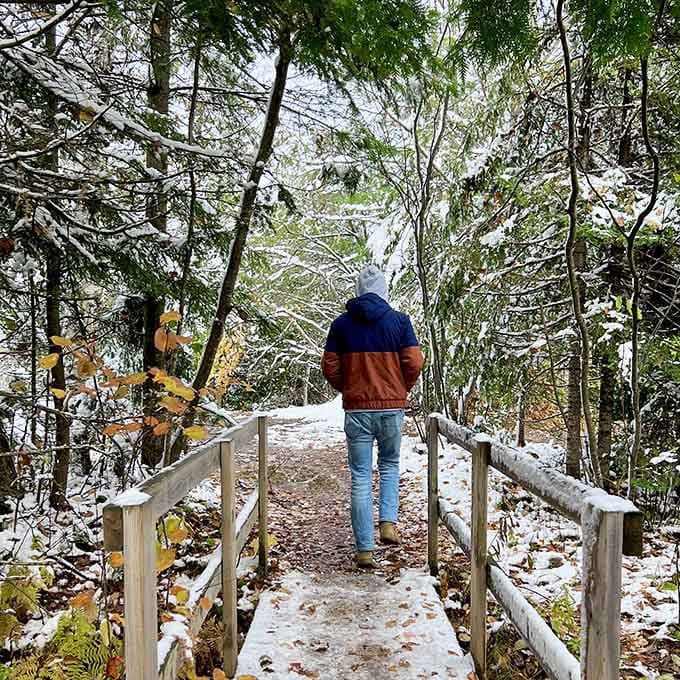 Even with a dusting of snow, the boardwalk beckons you forward toward that thundering reward ahead.