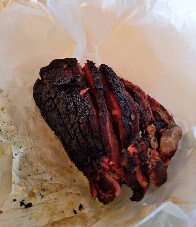 This brisket has the kind of bark that makes dogs jealous. The smoke ring is practically a halo &ndash; barbecue divinity in meat form.