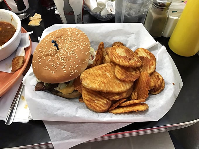 This isn't just a burger&mdash;it's a hand-formed masterpiece with golden waffle fries that crunch loud enough to echo across the tundra.