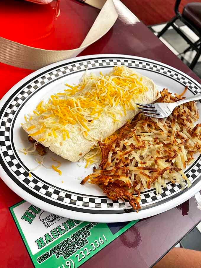 The breakfast burrito and hash browns &ndash; a dynamic duo that belongs in the Comfort Food Hall of Fame, complete with melty cheese crown.