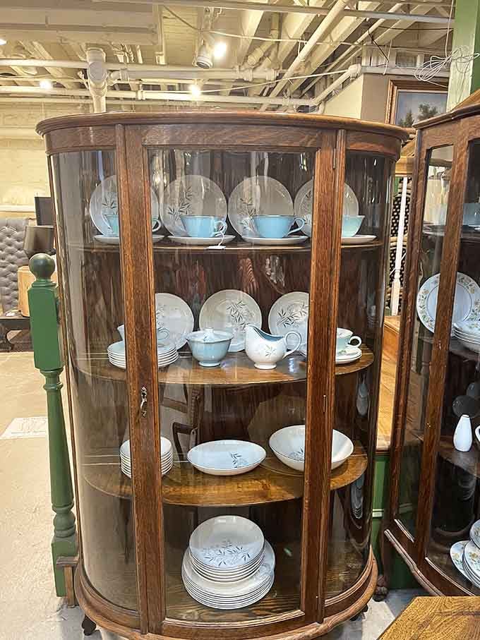 China cabinets displaying delicate treasures that survived decades without a single family dinner disaster.