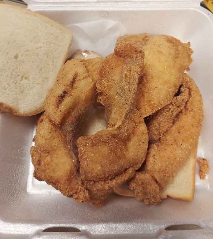 This catfish sandwich isn't trying to impress anyone with fancy presentation, yet somehow manages to be the most impressive thing you'll see today.