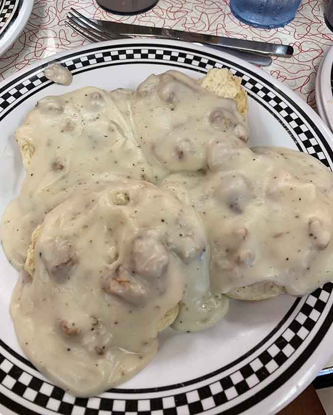 Biscuits drowning in sausage gravy, the kind of breakfast that makes you understand why people write country songs.