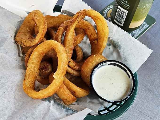Golden onion rings so perfectly crispy they deserve their own spot in the Rebel Alliance hall of fame.