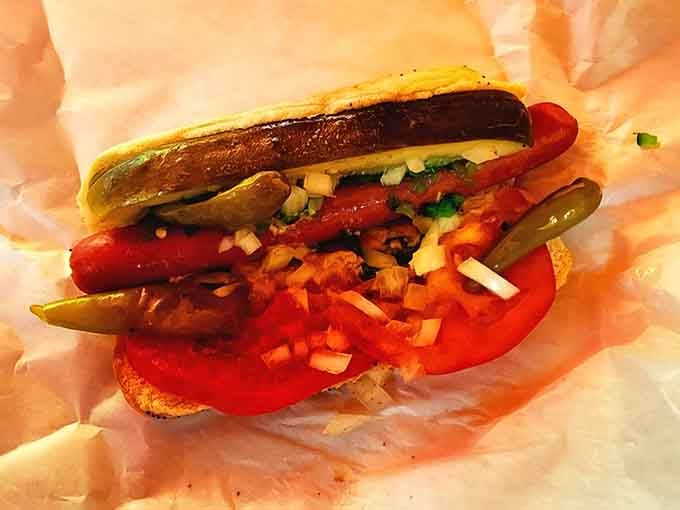 The Chicago dog in all its glory&mdash;Vienna Beef frank nestled in a poppy seed bun with the works. Notice what's missing? That's right, no ketchup in sight!