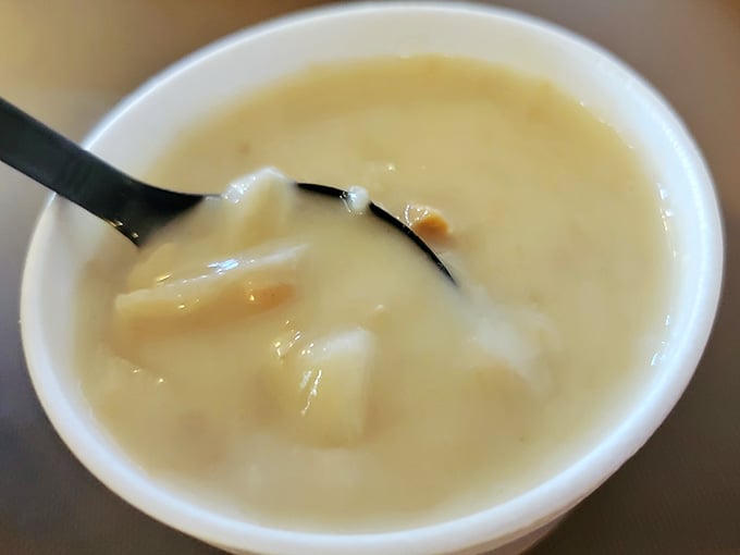 A bowl of creamy clam chowder that could make a New Englander homesick, with tender potato chunks swimming in velvety comfort.
