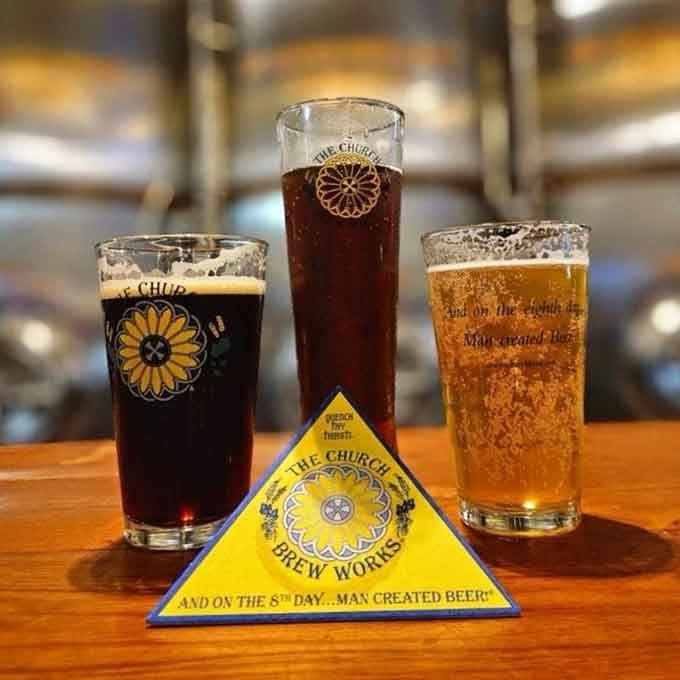 Three perfectly poured pints standing at attention like the holy trinity of hops, malt, and pure drinking pleasure.