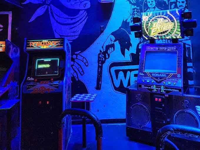 Dramatic lighting transforms classic arcade machines into works of art worthy of any modern museum installation.