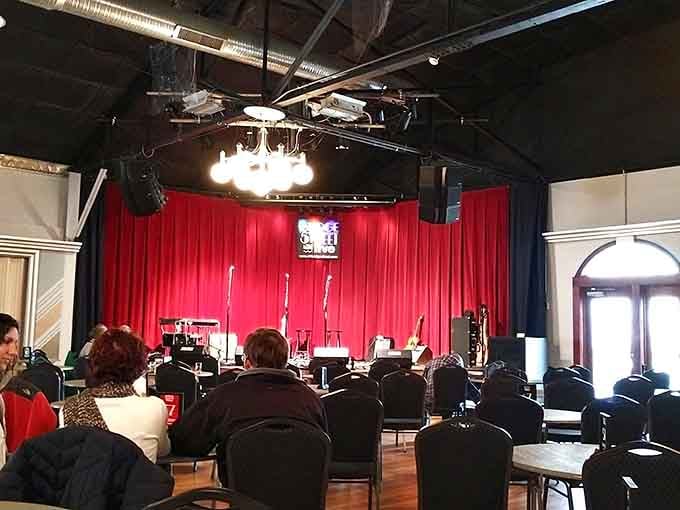 Live music in a space with exposed industrial bones hits different, like rock and roll finally found its proper home.