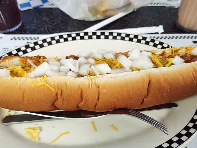 That Coney dog stretches the length of its bun like it's trying to win a race.