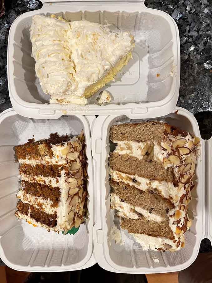 Three slices of heaven in takeout containers, because sometimes you need backup cake for later. Smart thinking.