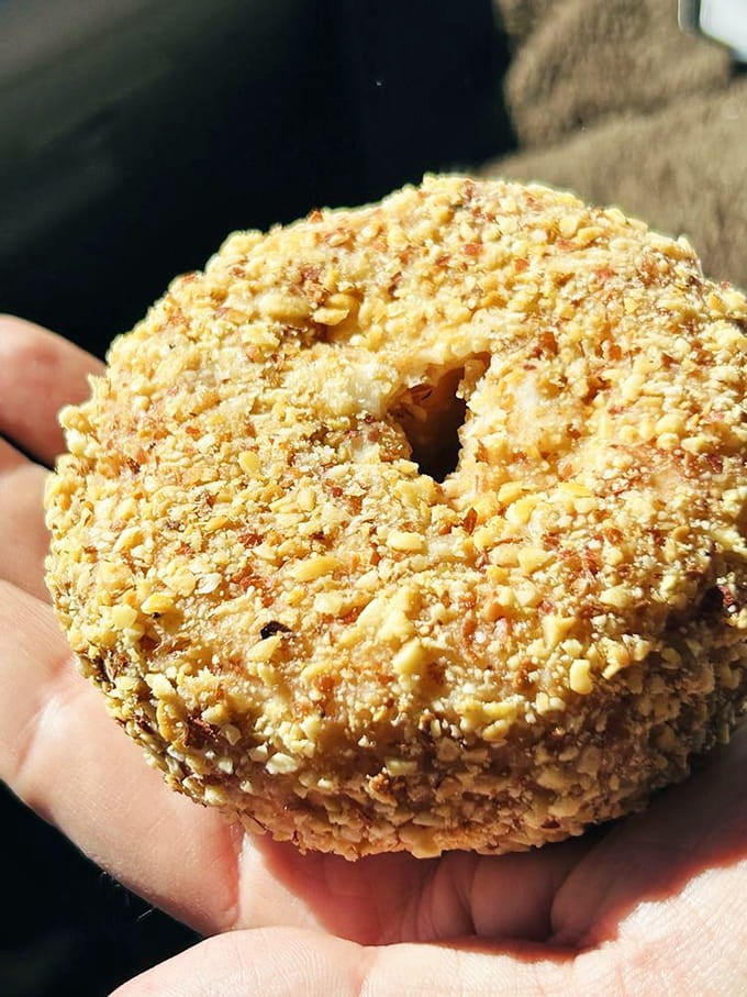 This nutty cake creation wears its crunchy coating like a badge of honor, sweet and substantial.