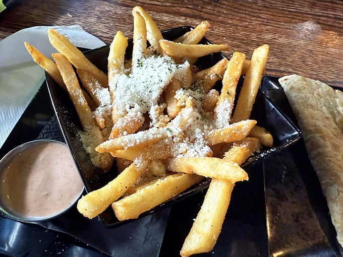 Garlic parmesan fries dusted with cheese like edible snow, because regular fries clearly weren't trying hard enough.