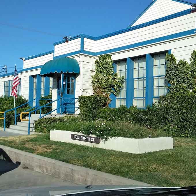 The Cultural Arts Center's charming blue trim and welcoming facade house community events that prove desert living doesn't mean cultural drought.