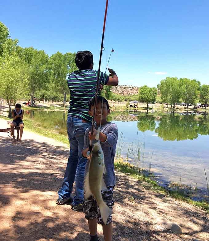 That proud smile says it all: fishing here actually produces fish, not just stories about the one that got away.